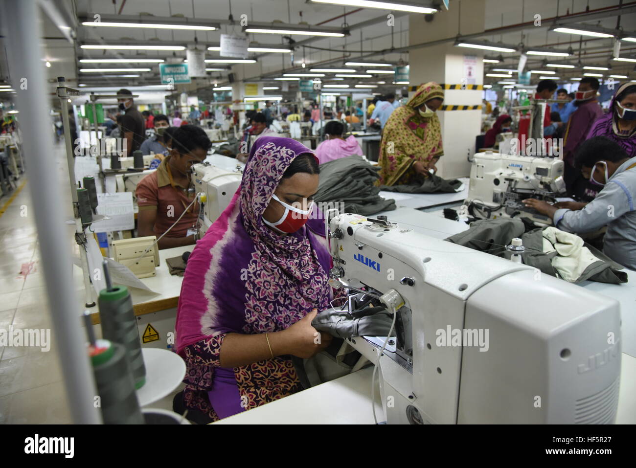 Bangladesh labors works in a Ready made garment (RMG) factory in ...