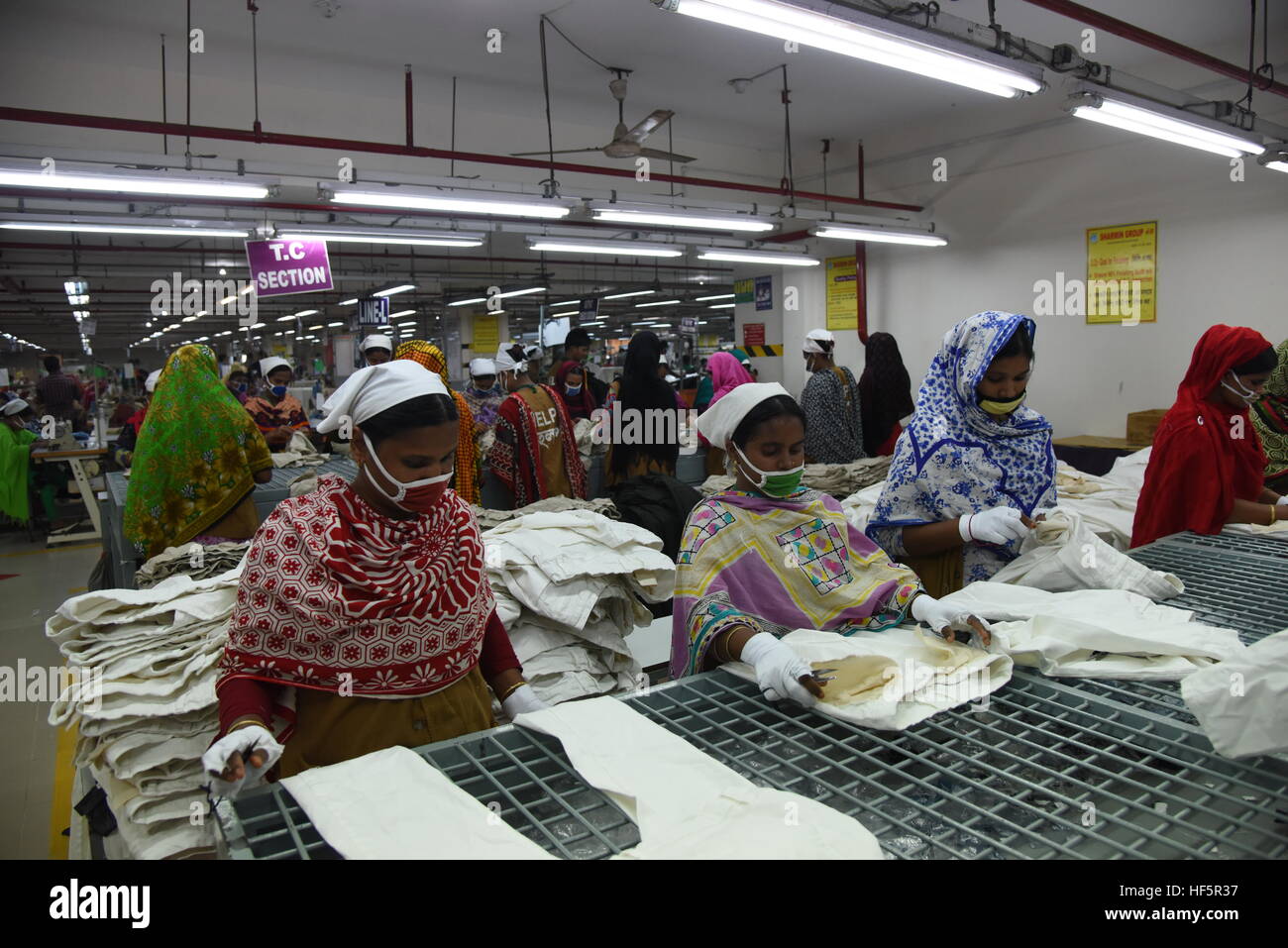 Bangladesh labors works in a Ready made garment (RMG) factory in ...