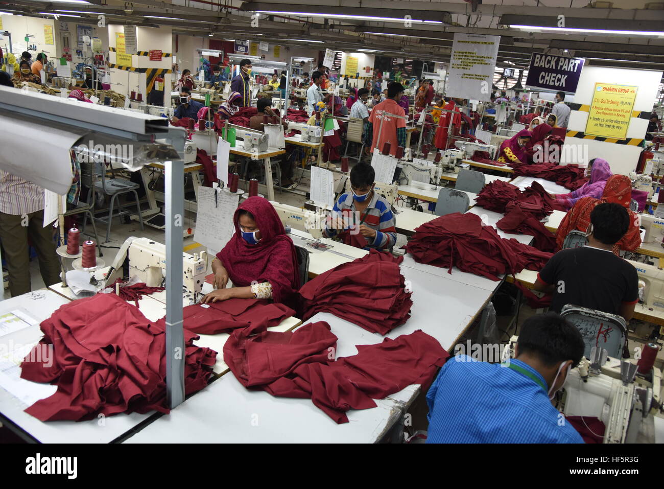 Bangladesh labors works in a Ready made garment (RMG) factory in ...