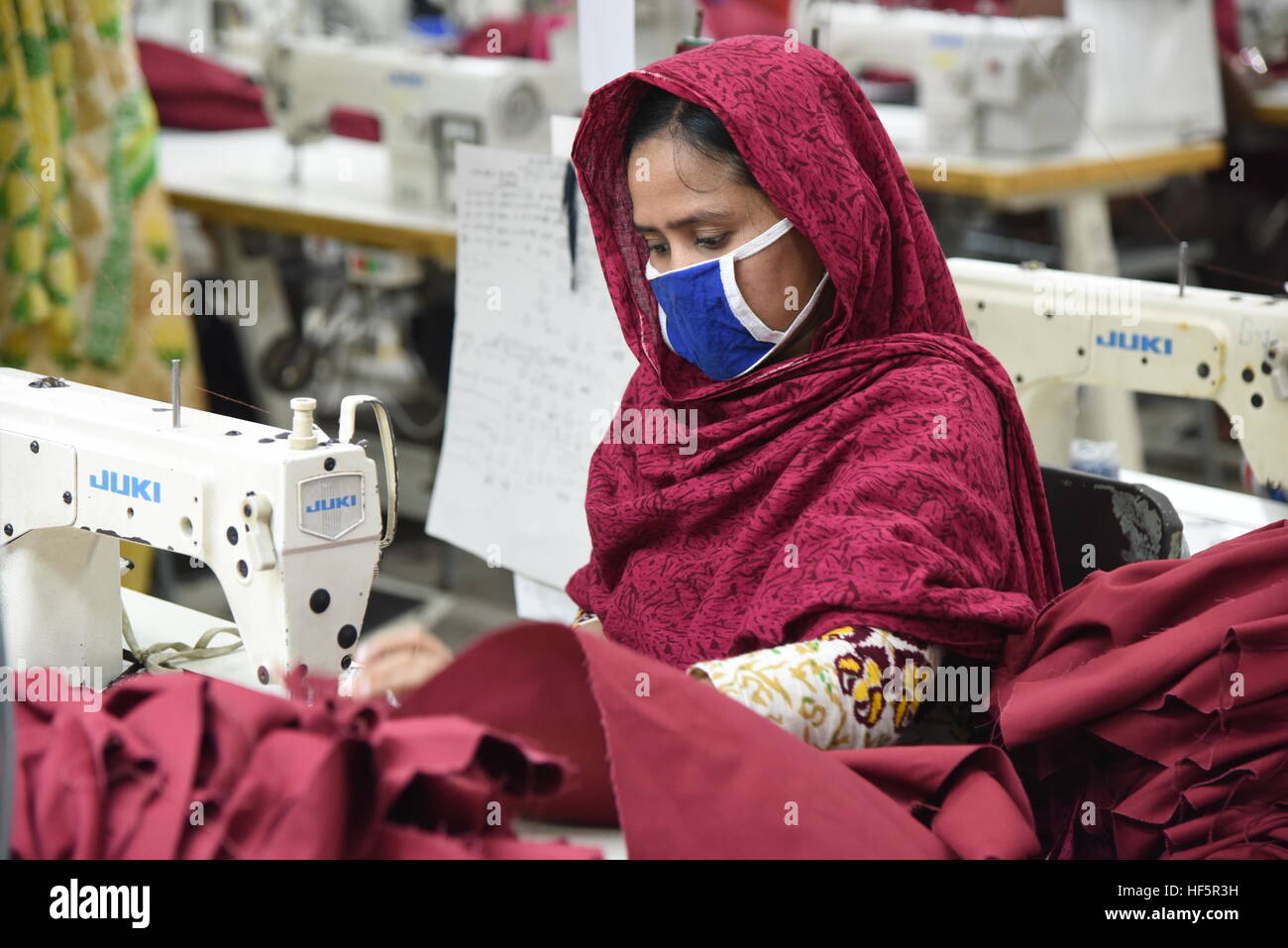 Bangladesh labors works in a Ready made garment (RMG) factory in ...