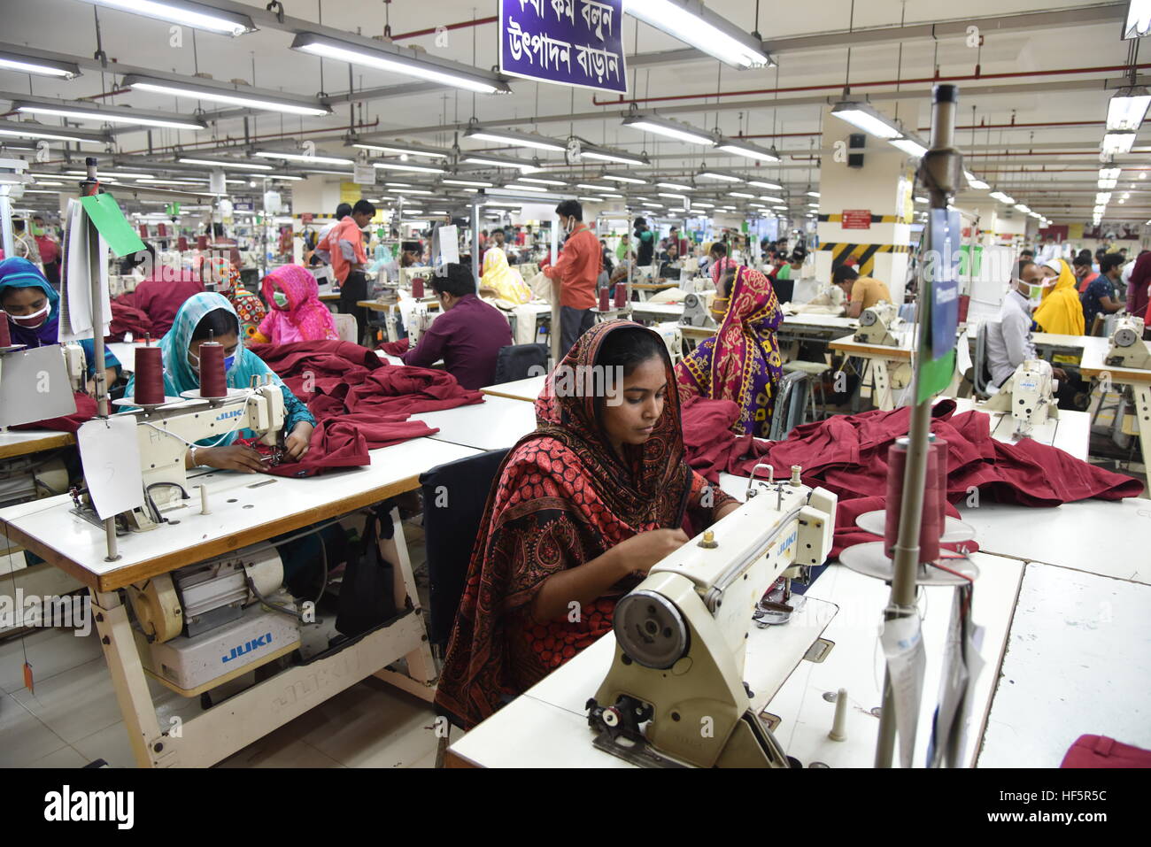 Bangladesh labors works in a Ready made garment (RMG) factory in ...