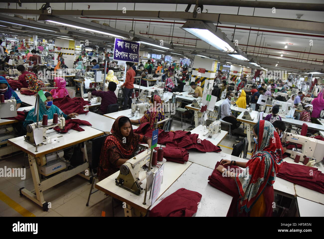 Bangladesh labors works in a Ready made garment (RMG) factory in ...