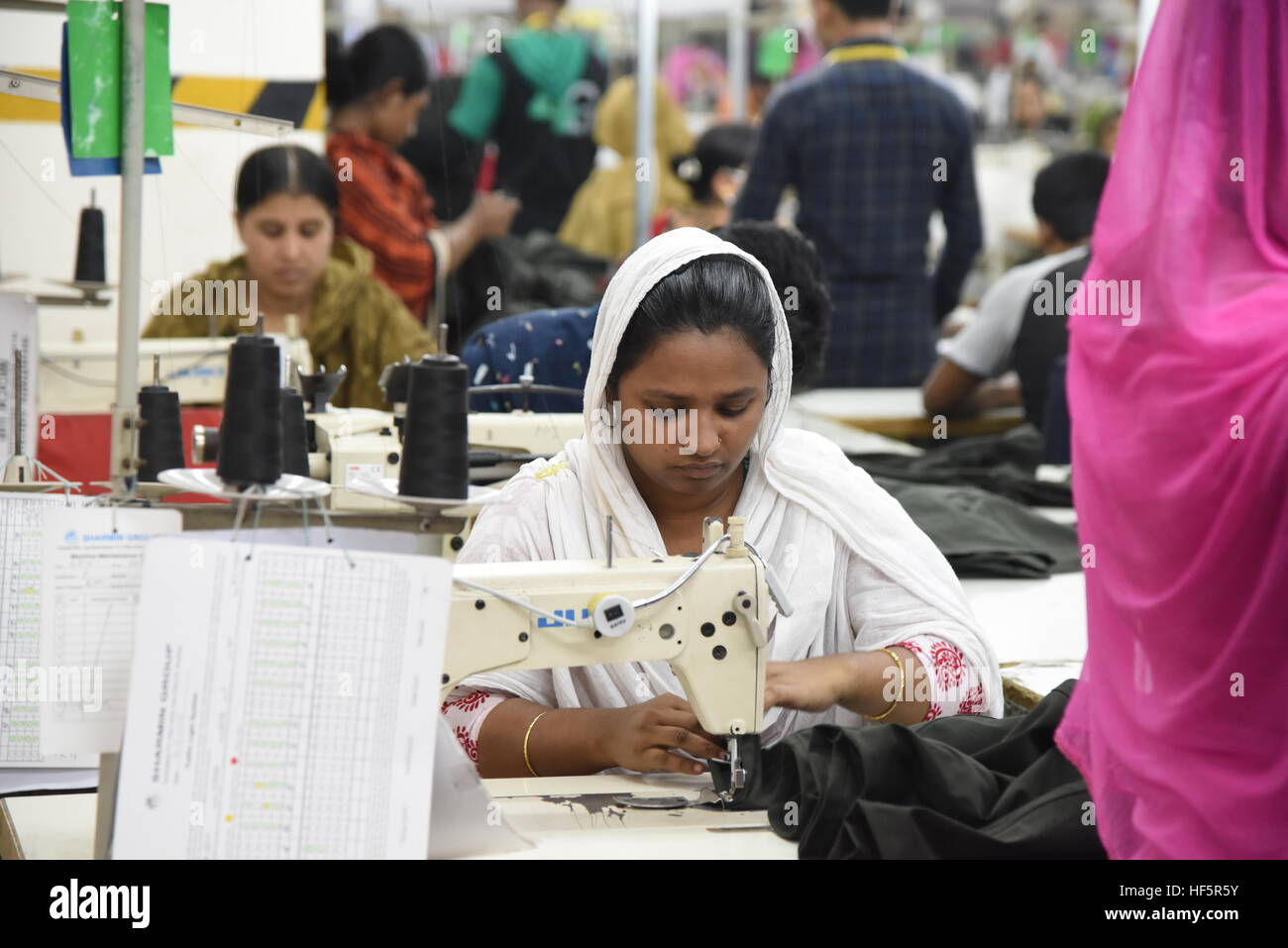 Bangladesh labors works in a Ready made garment (RMG) factory in ...