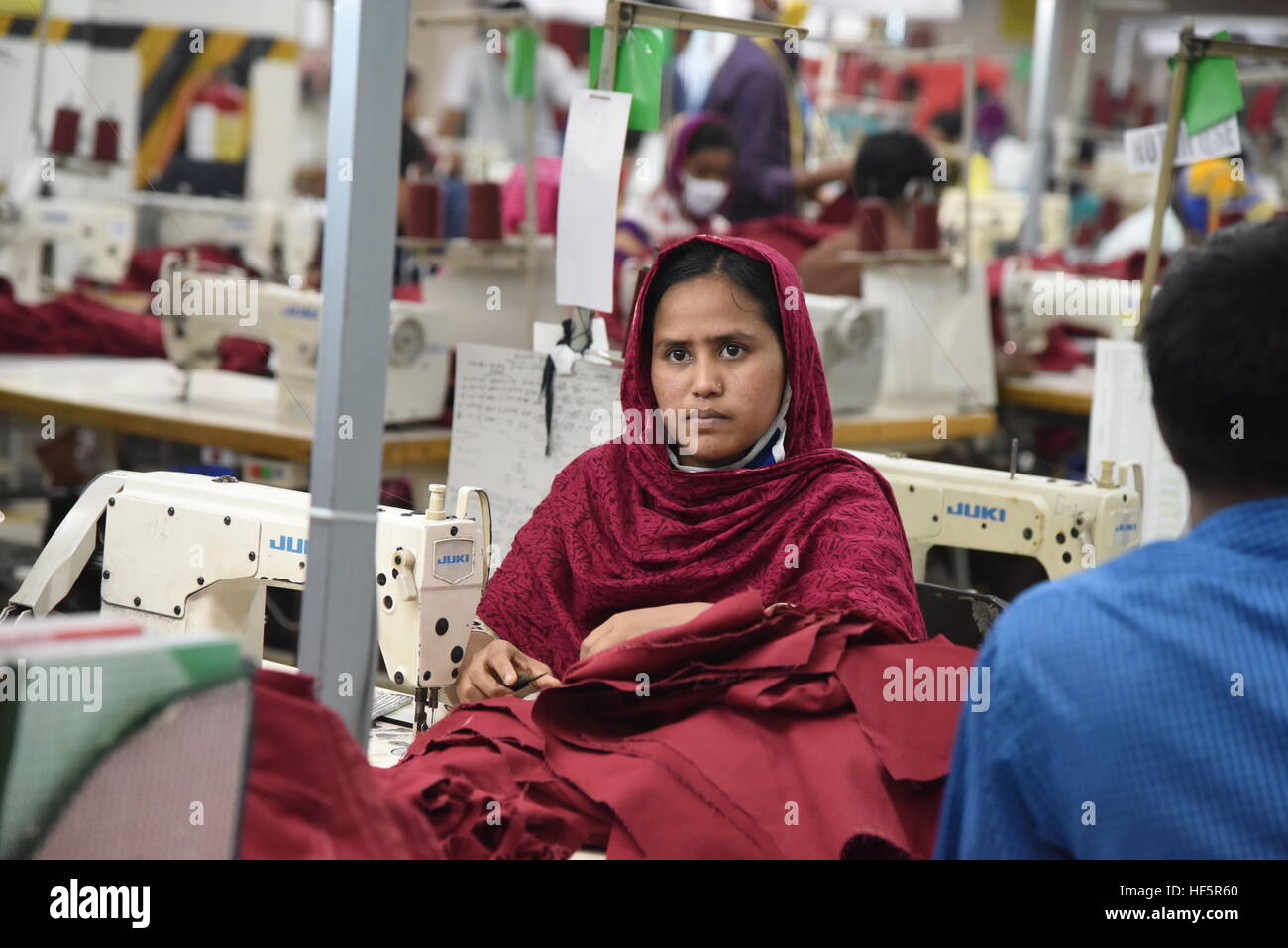 Bangladesh labors works in a Ready made garment (RMG) factory in ...