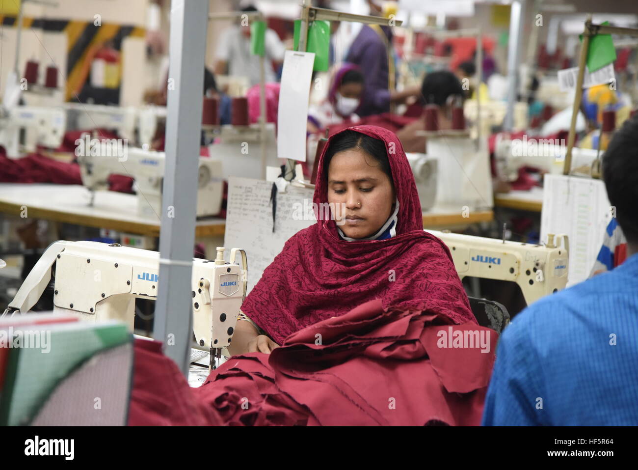 Bangladesh labors works in a Ready made garment (RMG) factory in ...