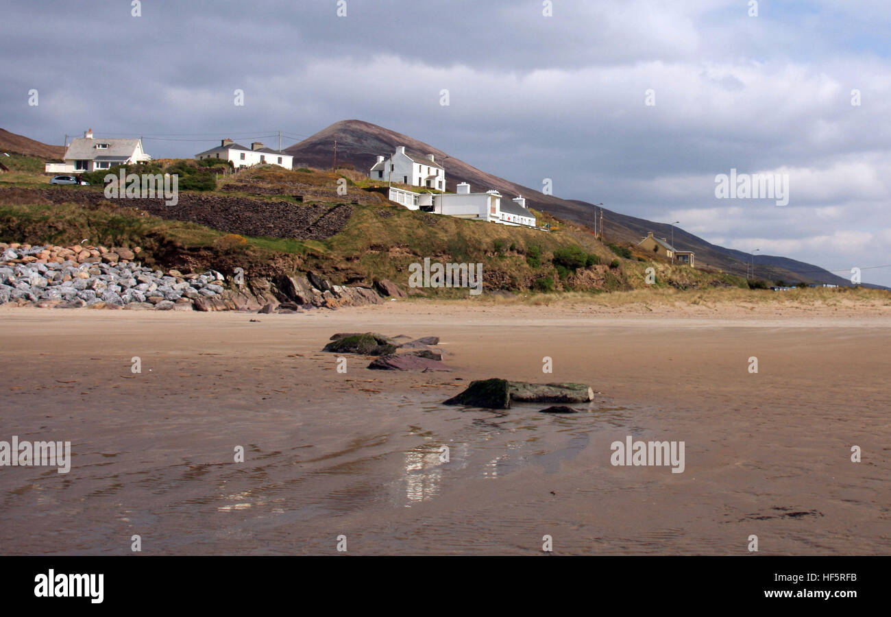 Ireland beach house rocks mountain Stock Photo - Alamy