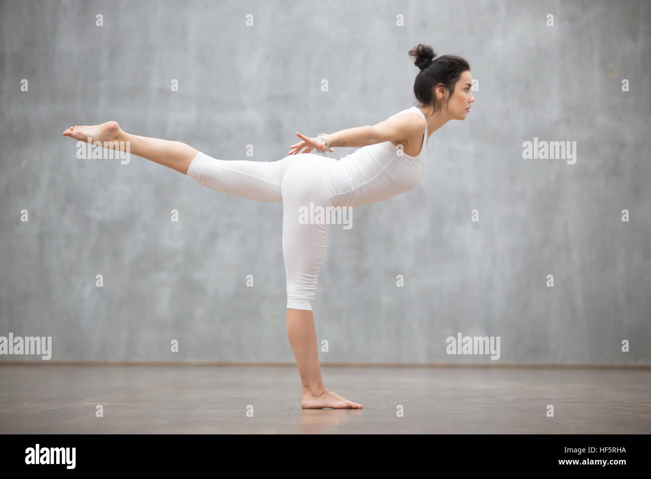 Beautiful Yoga: Virabhadrasana three pose Stock Photo - Alamy