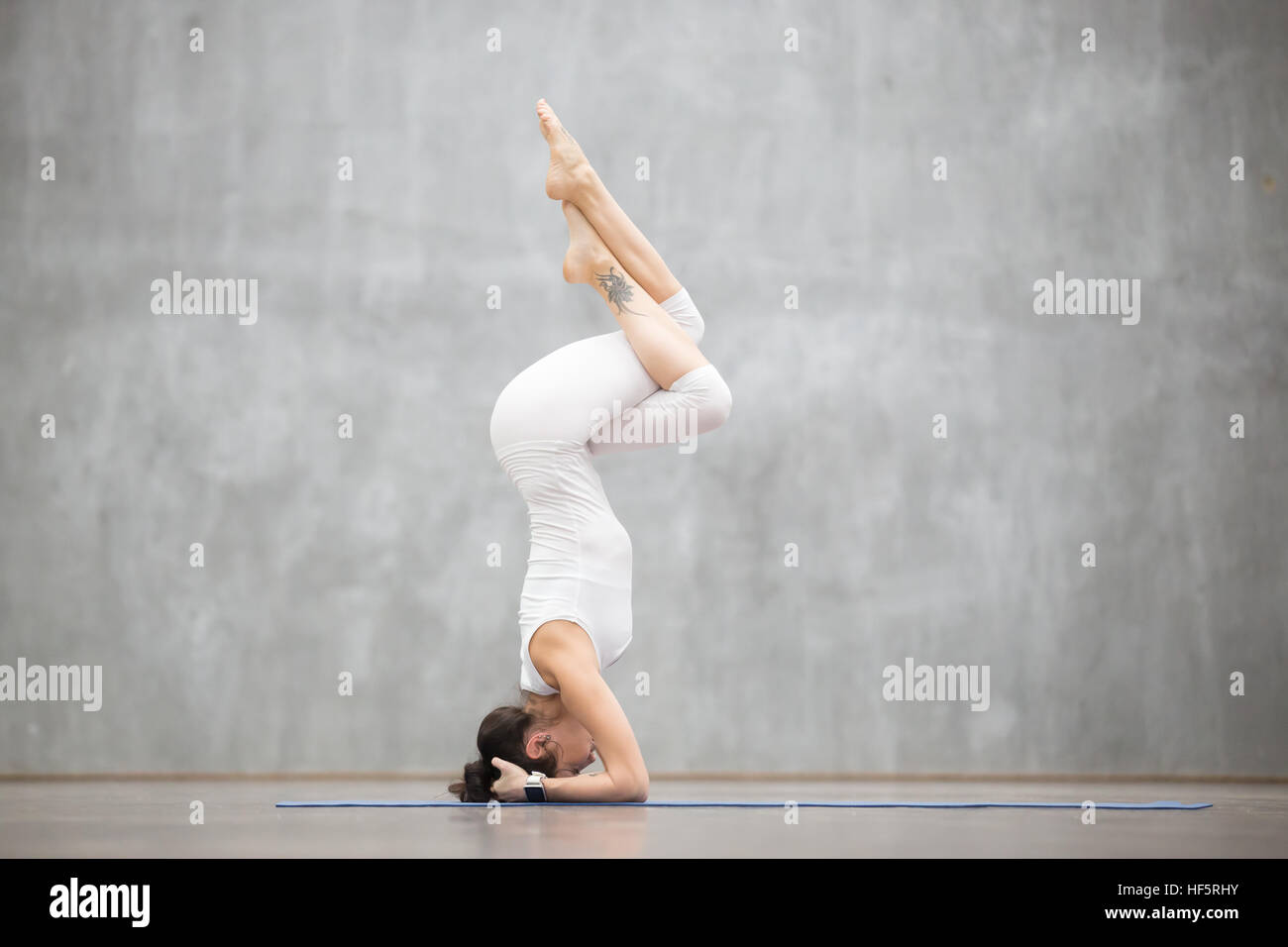 Beautiful Yoga: Garuda salamba sirsasana pose Stock Photo - Alamy