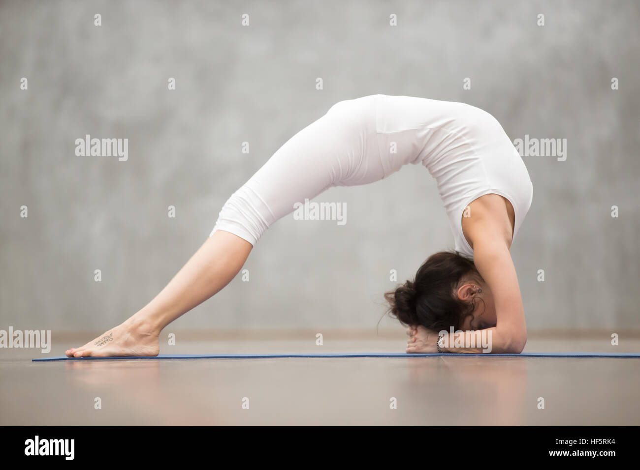 Beautiful Yoga: Elbow Bridge pose Stock Photo - Alamy