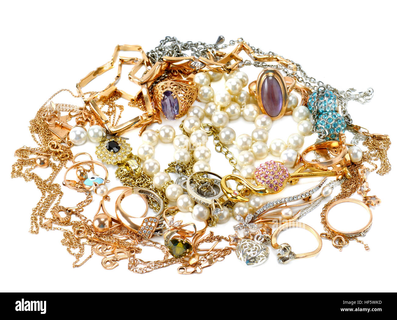 gold jewelry isolated on white background Stock Photo - Alamy