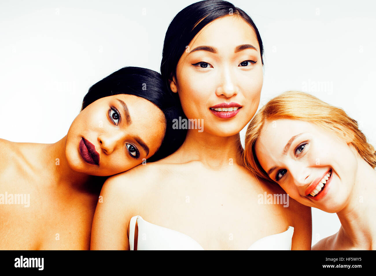 three different nation woman: asian, african-american, caucasian ...