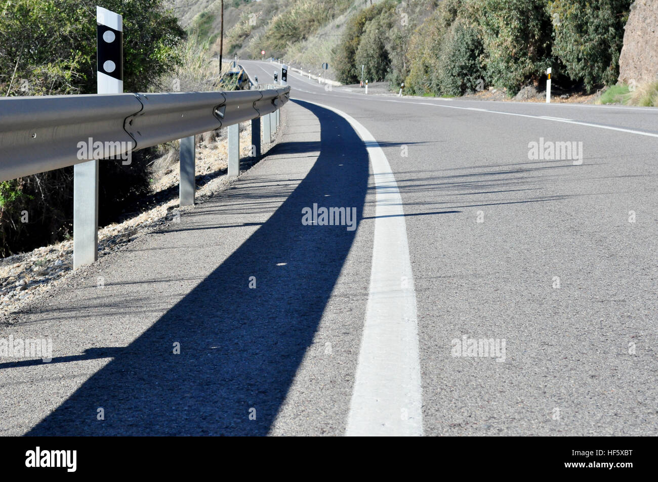 Road, parapet and asphalt with white line Stock Photo - Alamy