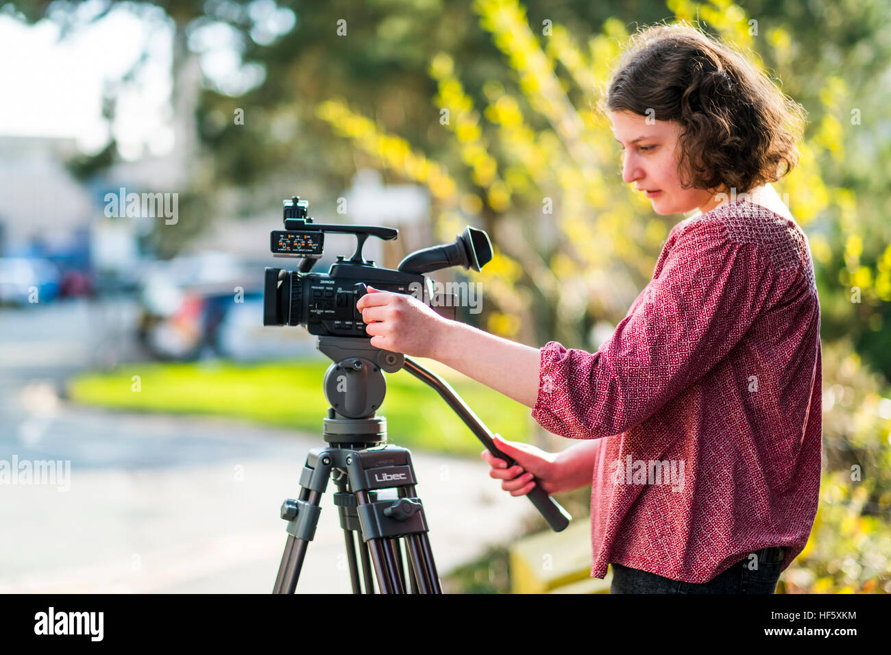 Video woman filming university hi-res stock photography and images - Alamy