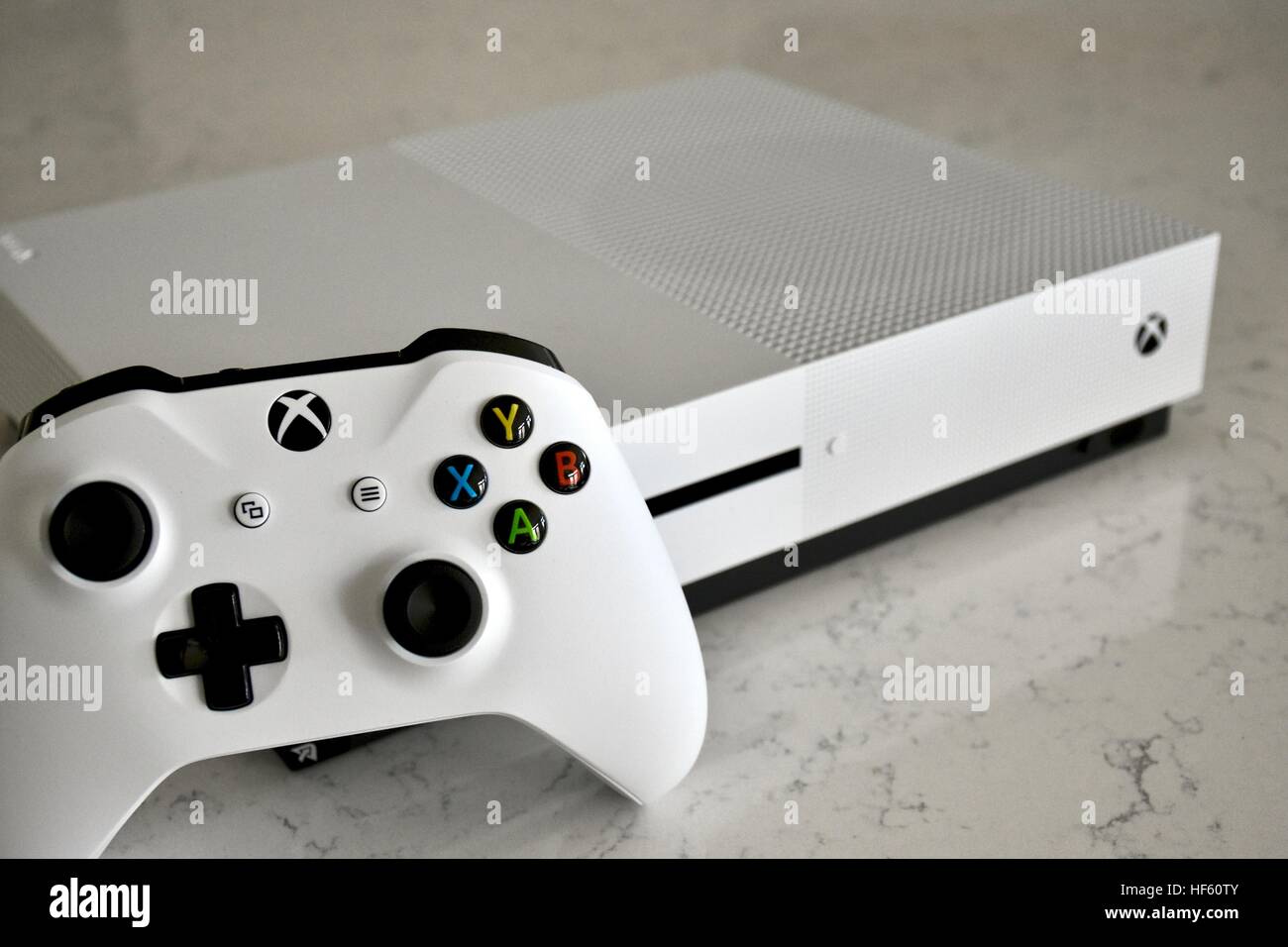 A white Xbox One S displayed on a white marble background Stock Photo ...