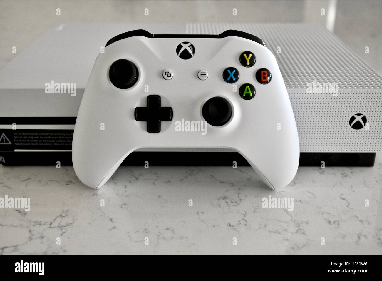A white Xbox One S displayed on a white marble background Stock Photo ...
