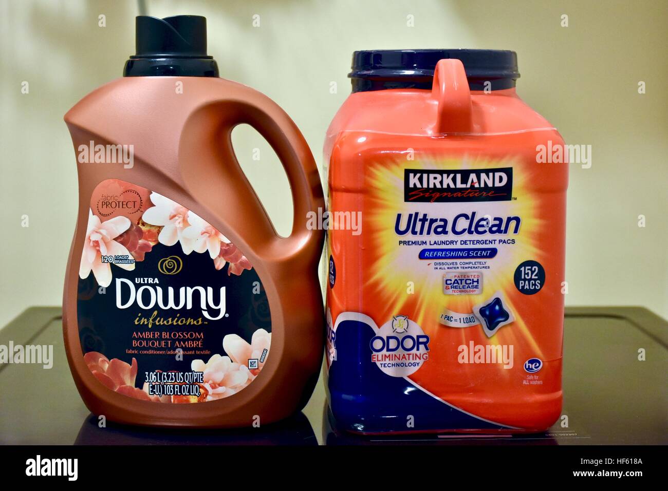 Washing machine pods and fabric softener sitting on top of the washer ...