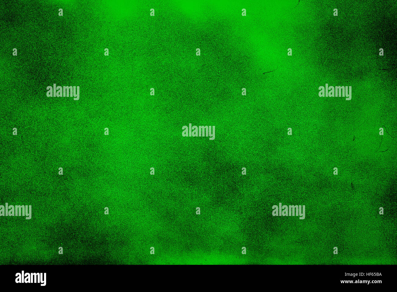 Green texture background with bright center spotlight Stock Photo - Alamy