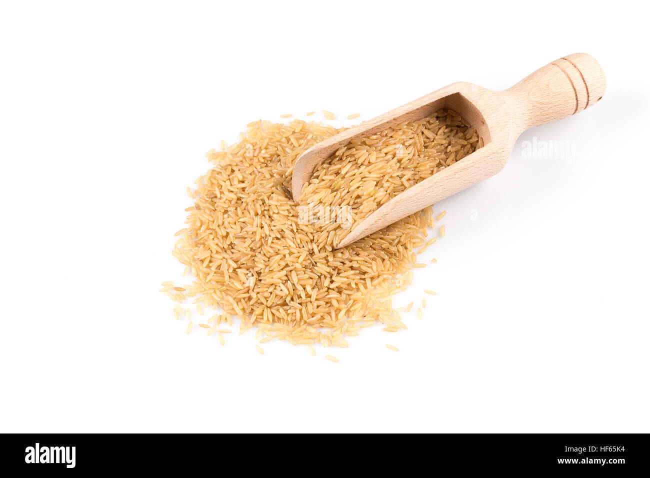 pile of brown rice isolated on white background Stock Photo - Alamy