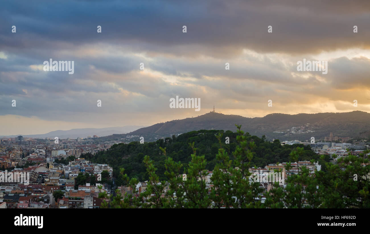 Blue yellow clouds on hills near Barcelona, Spain Stock Photo - Alamy