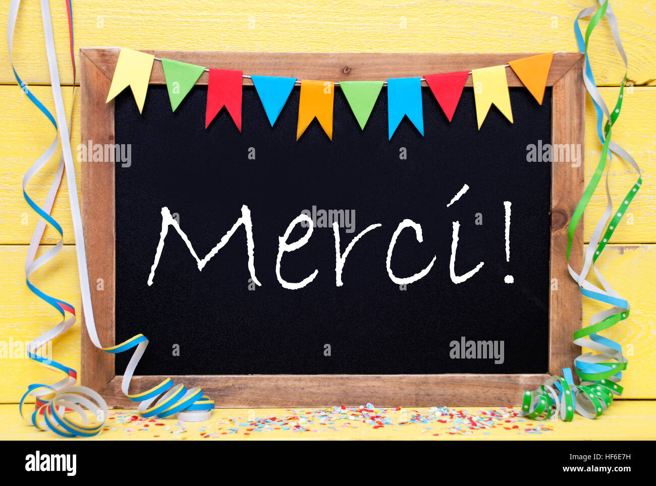 Chalkboard With Streamer, Merci Means Thank You Stock Photo - Alamy