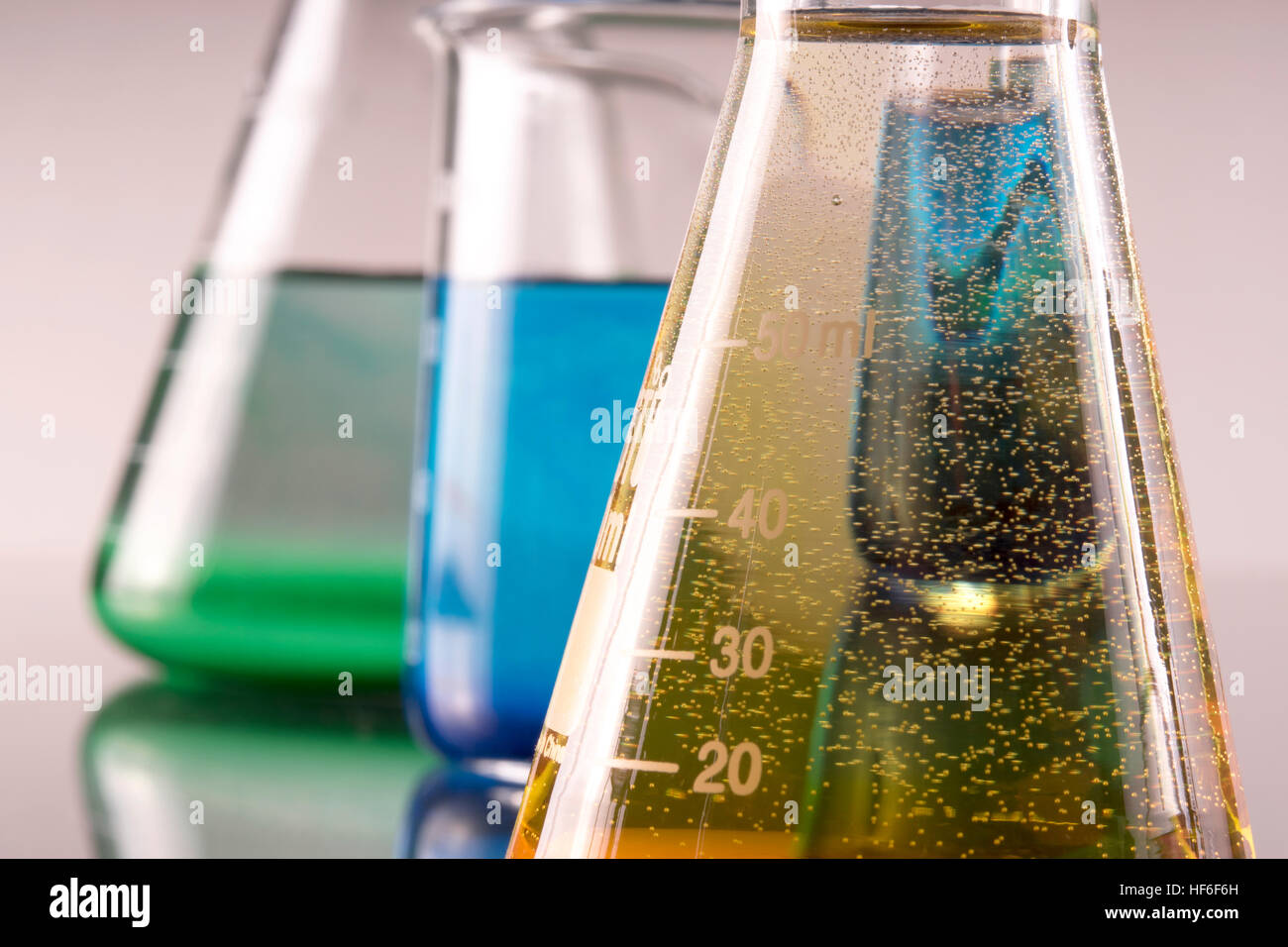 Chemistry abstract of colorful chemicals and glassware Stock Photo - Alamy