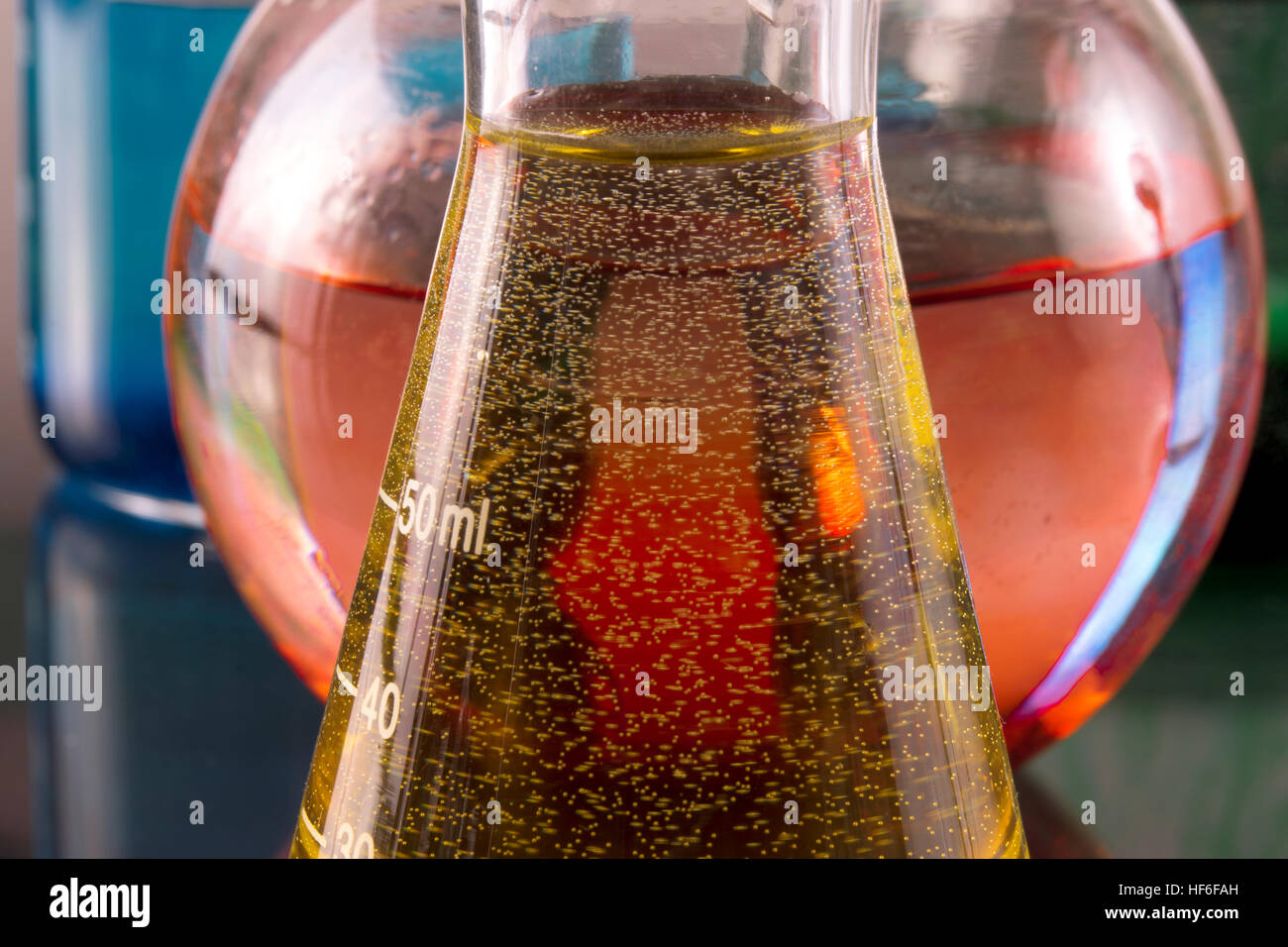 Chemistry abstract of colorful chemicals and glassware Stock Photo - Alamy