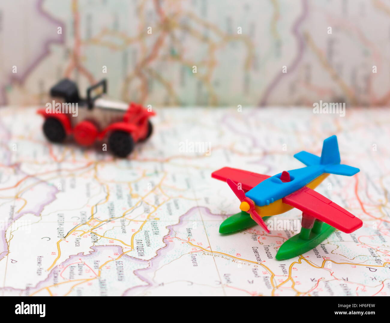 Miniature car and airplane on map , travel around the world, wallpaper ...