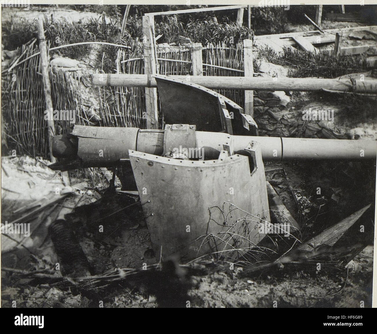 A destroyed artillery piece on the Grado landing stage during World War ...