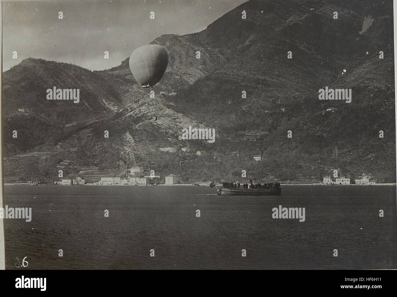 A photograph showing the ascent of a balloon from a ship during the ...
