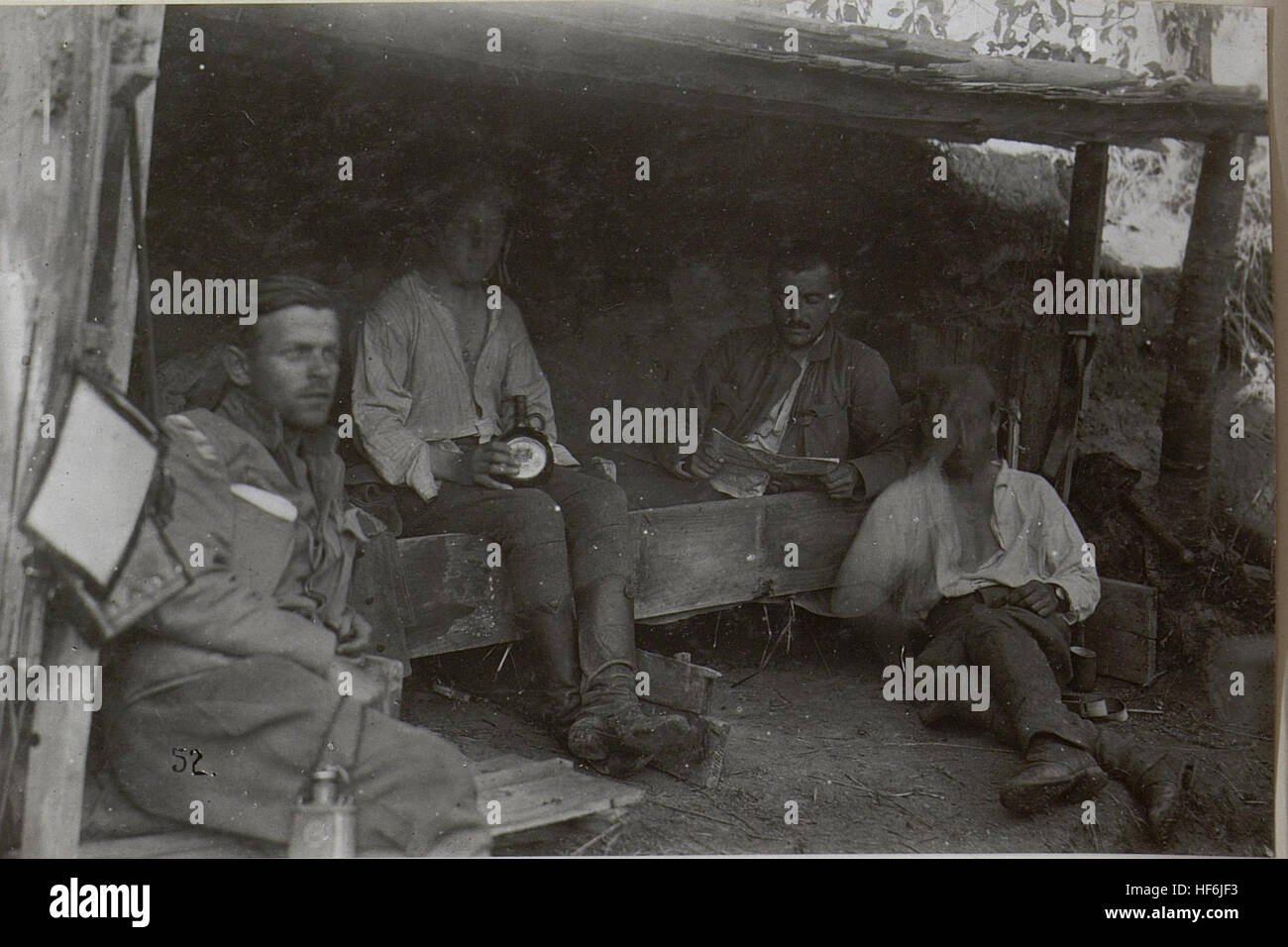 A photograph showing soldiers taking a break in a shelter during World ...