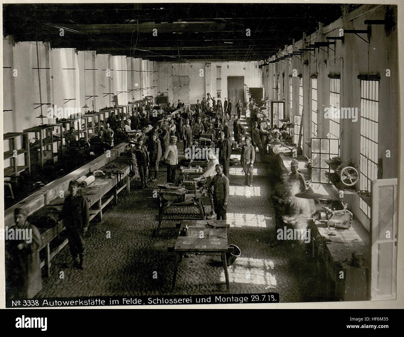 A photograph showing a field workshop with blacksmithing and assembly ...