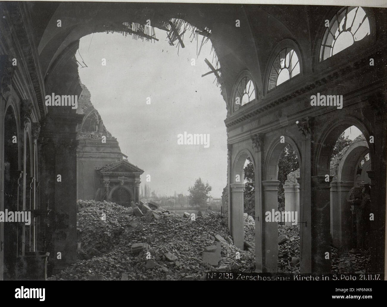 A damaged church in San Polo during World War I, illustrating the ...