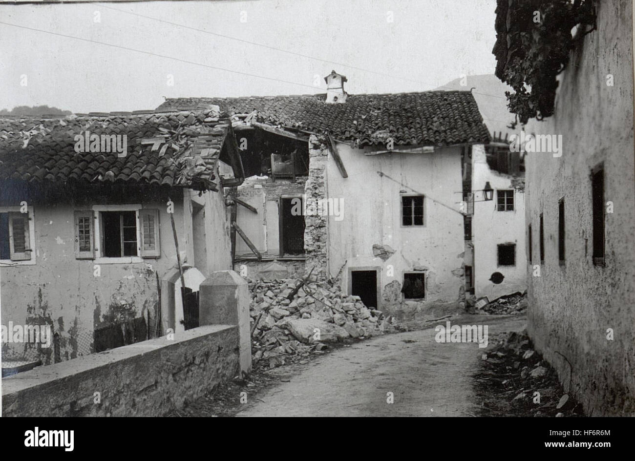A photograph documenting houses destroyed by enemy artillery shells ...