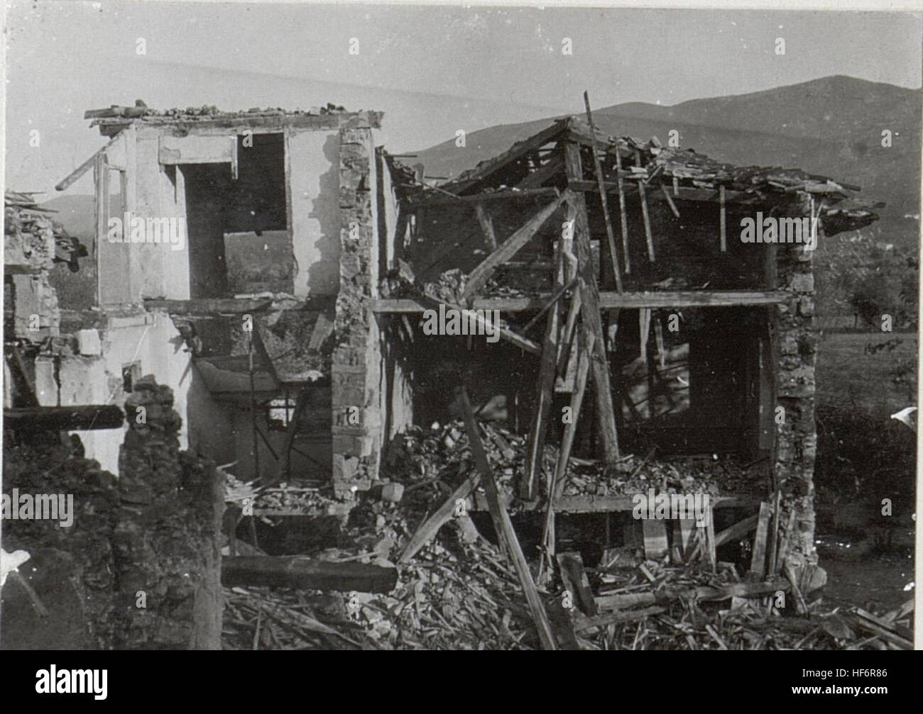A photograph showing a house destroyed by a 28 cm shell near Biglia ...