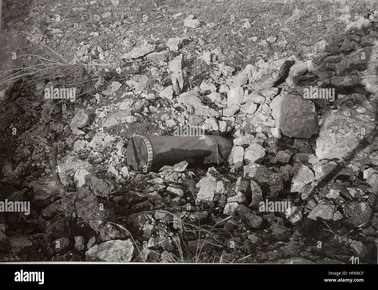 A World War I photograph showing a live unexploded Italian 38 cm shell ...