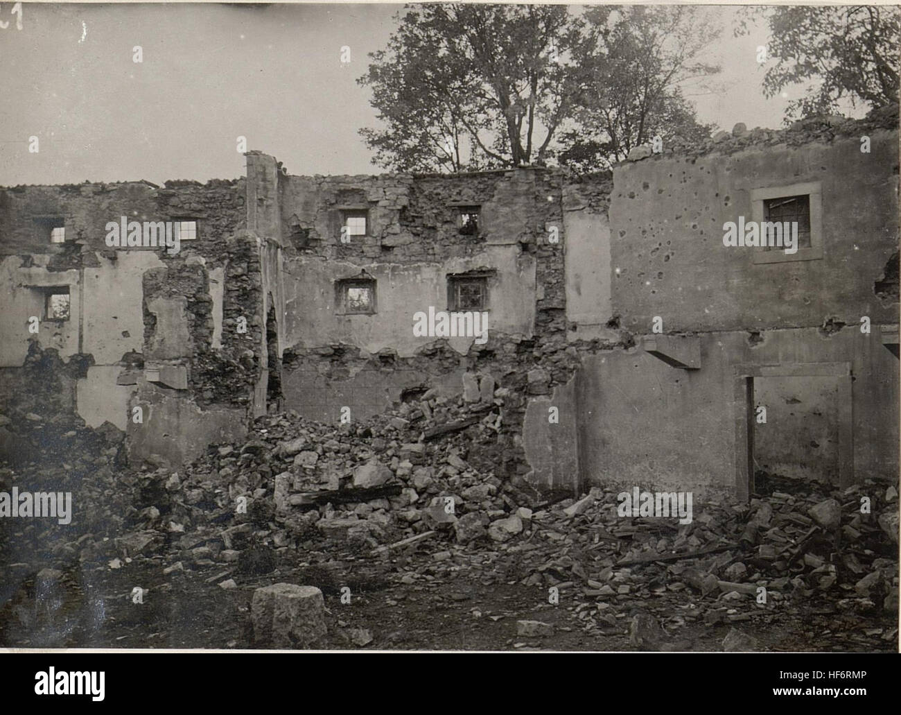 A photograph showing the destroyed buildings in Vojscica on August 29 ...