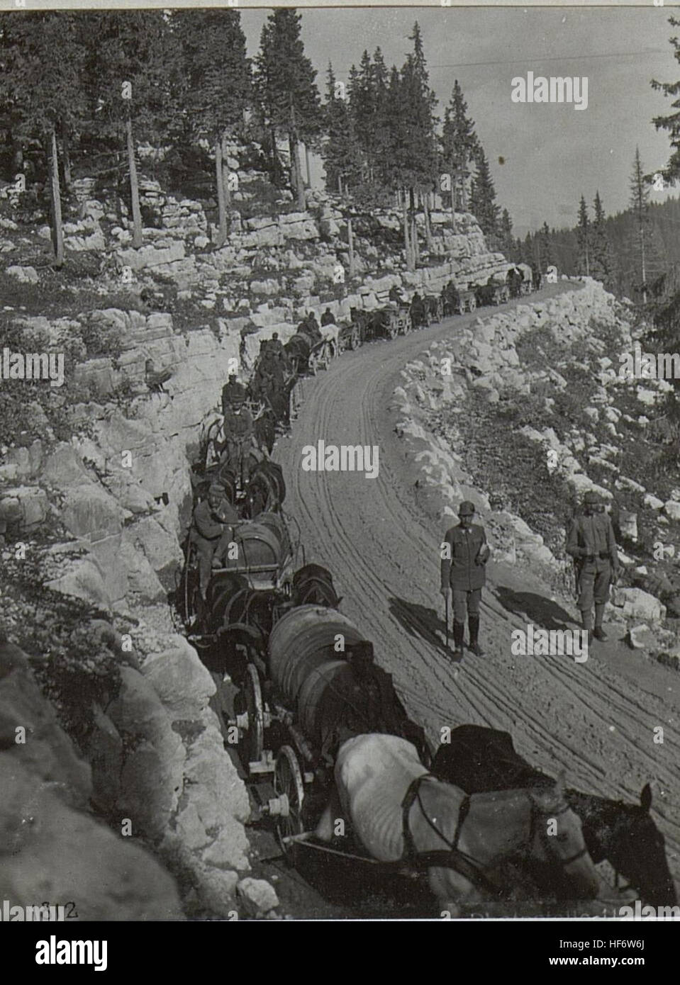 A World War I photograph depicting a train at a water collection point ...