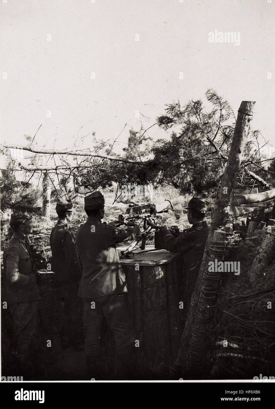 A photograph showing a machine gun in firing position at Zarzece ...