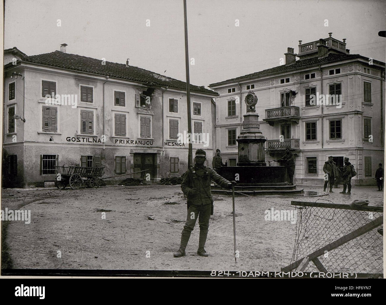 The main square in Tolmein with bombed buildings during World War I, as ...