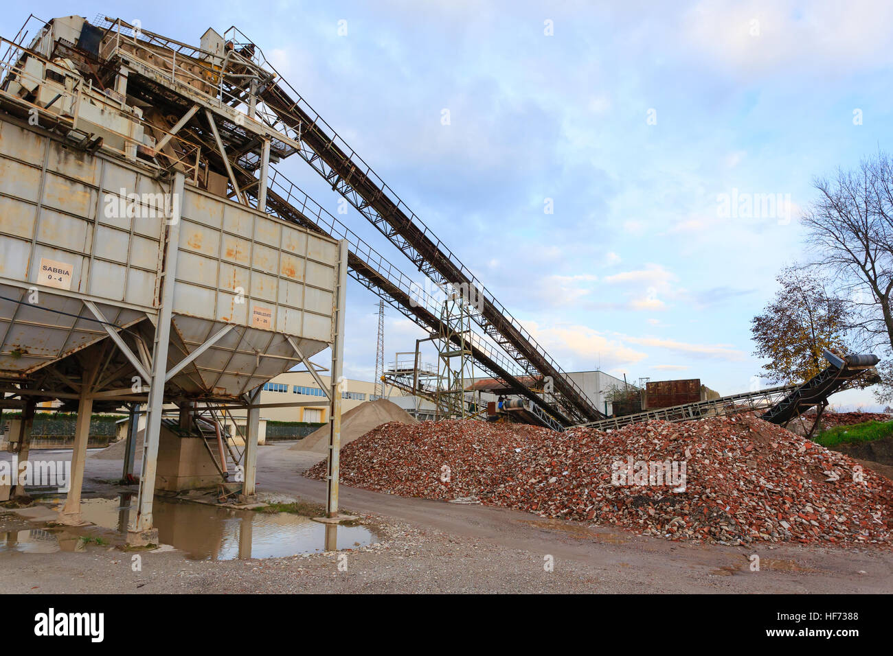 Stone quarry with silos and conveyor belts. Industrial equipment ...