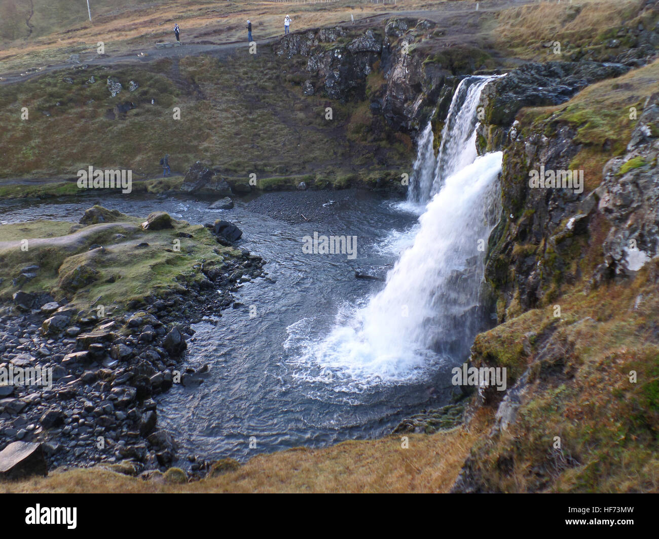Kirkjufellsfoss waterfall in the early winter, Snaefellsness Peninsula ...