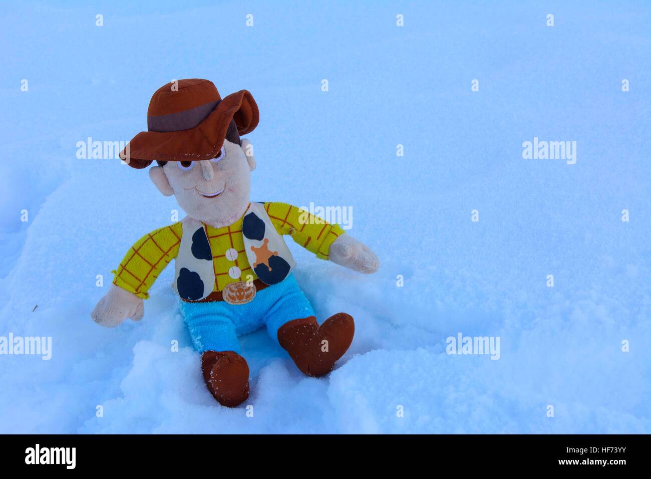 Plush toy for children on white snow is one Stock Photo - Alamy