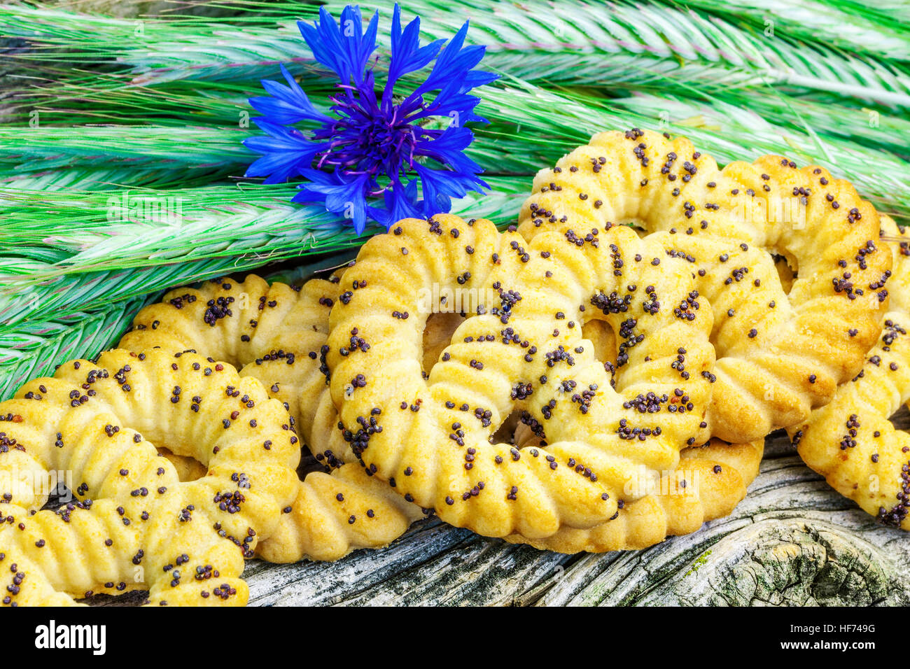 Cookies with cereal ears and cornflower Stock Photo - Alamy