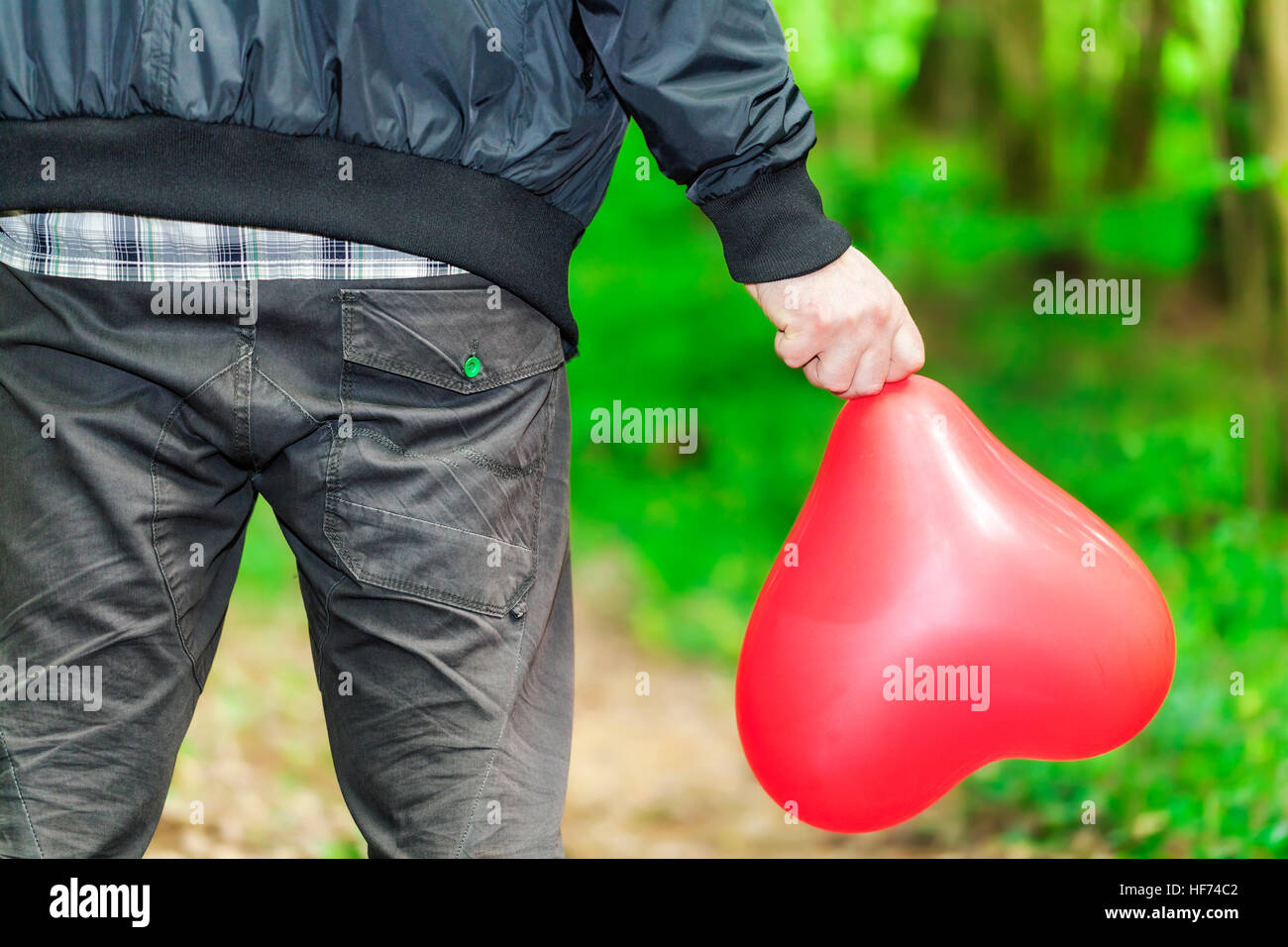 Man with balloon Stock Photo - Alamy