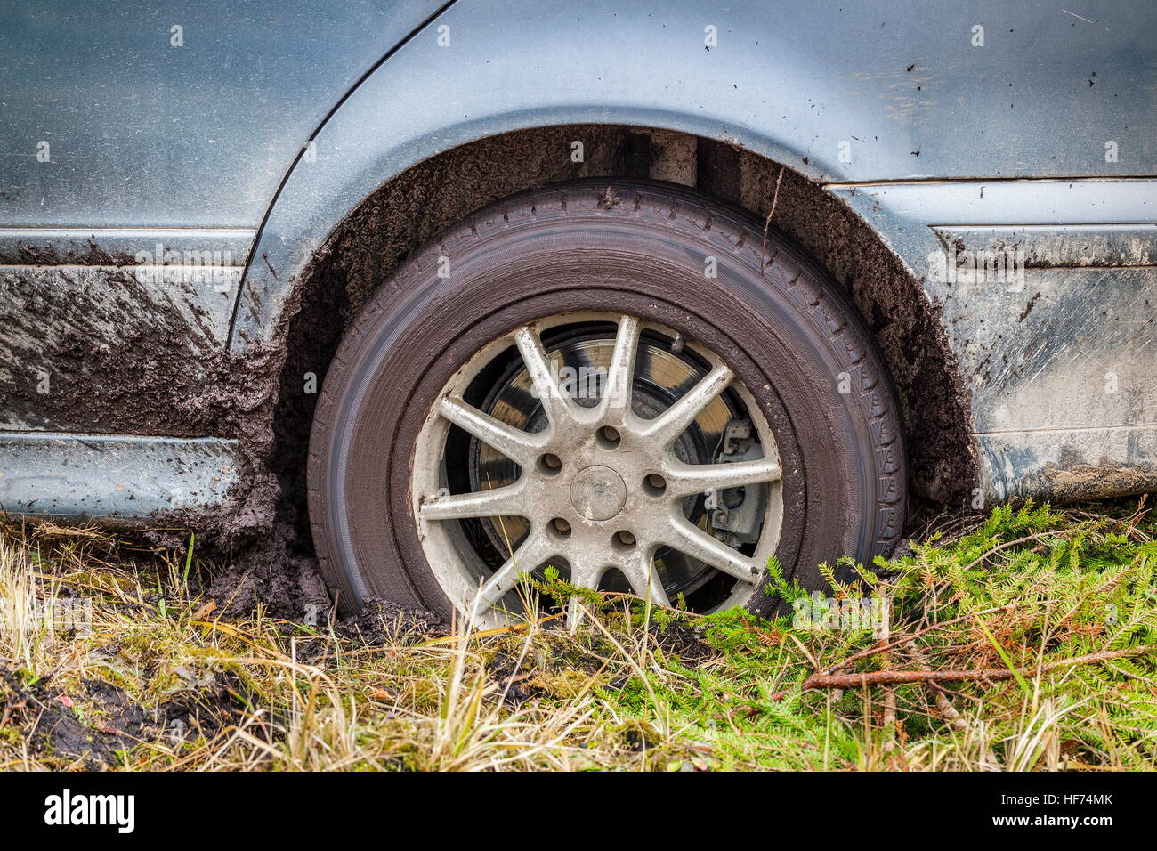 Stuck car in the mud Stock Photo - Alamy