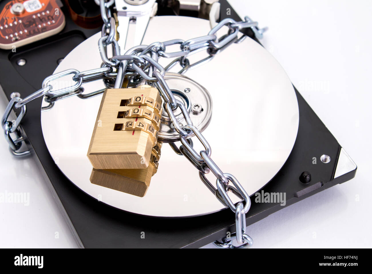 Hard drive disk and combination lock padlock. Data security concept ...