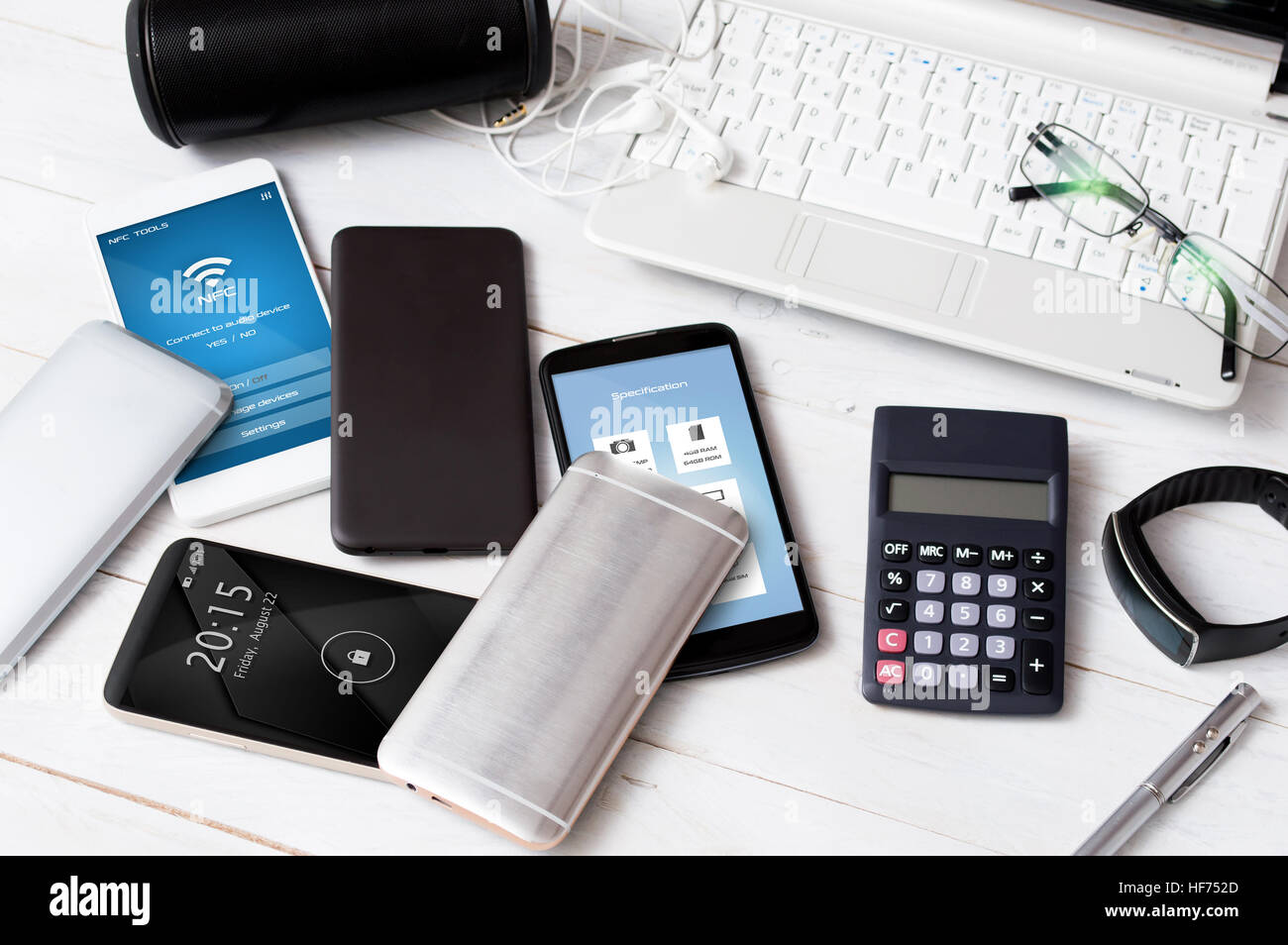 High-end smartphones scattered on the white wooden desk Stock Photo - Alamy