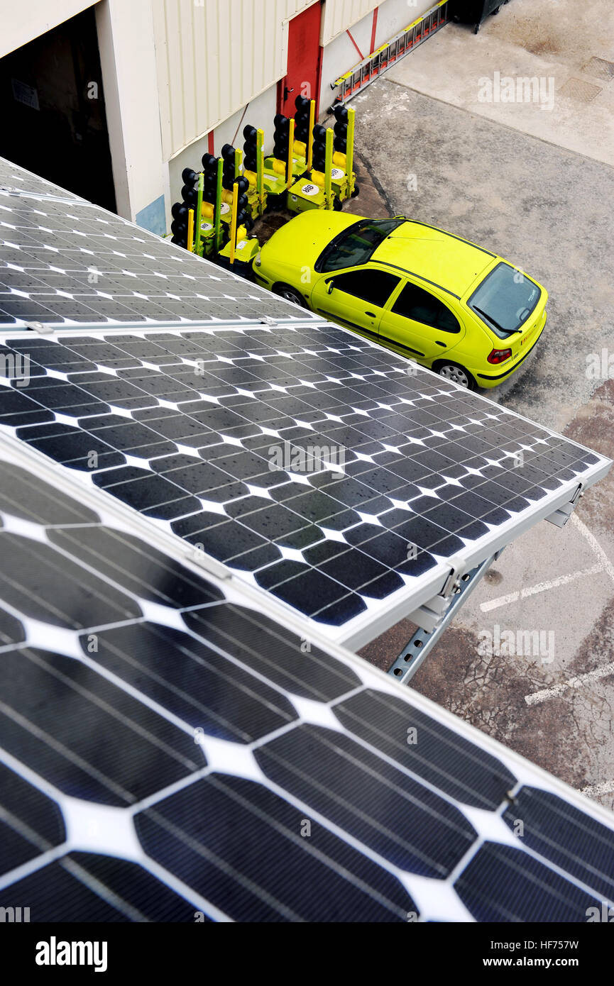 Solar panels on a roof of an office building Stock Photo - Alamy