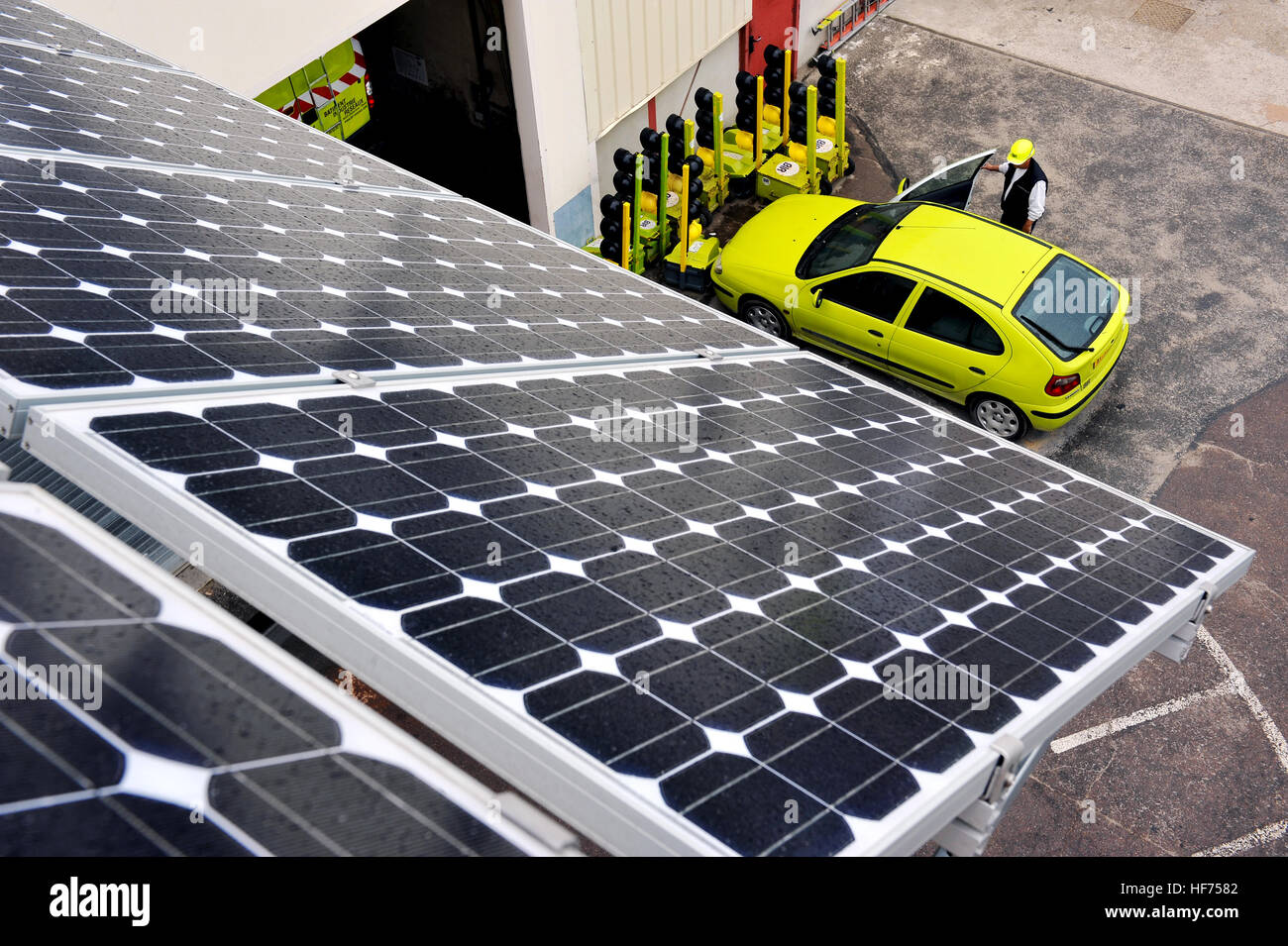 Solar panels on a roof of an office building Stock Photo - Alamy