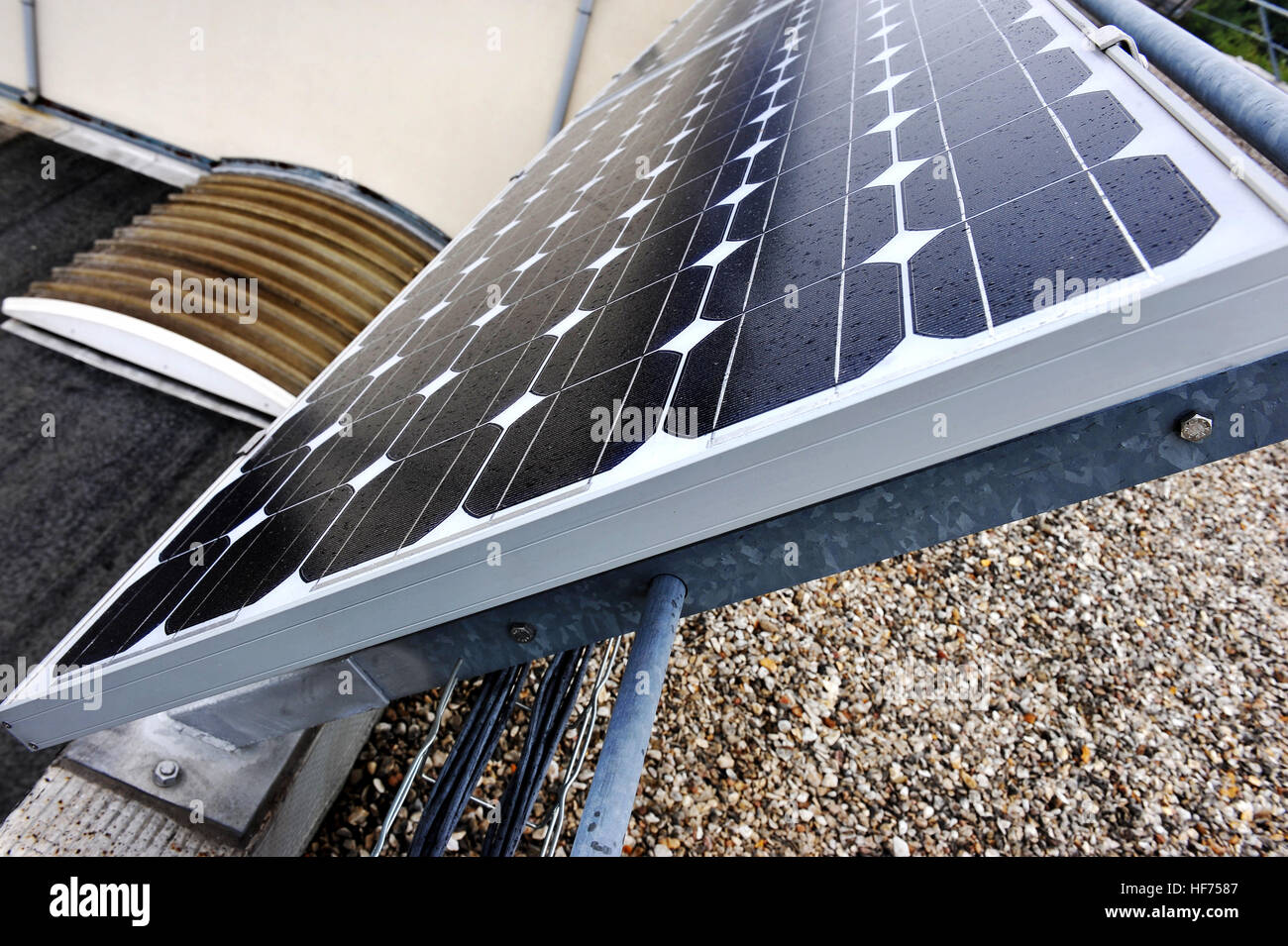 Solar panels on a roof of an office building Stock Photo - Alamy